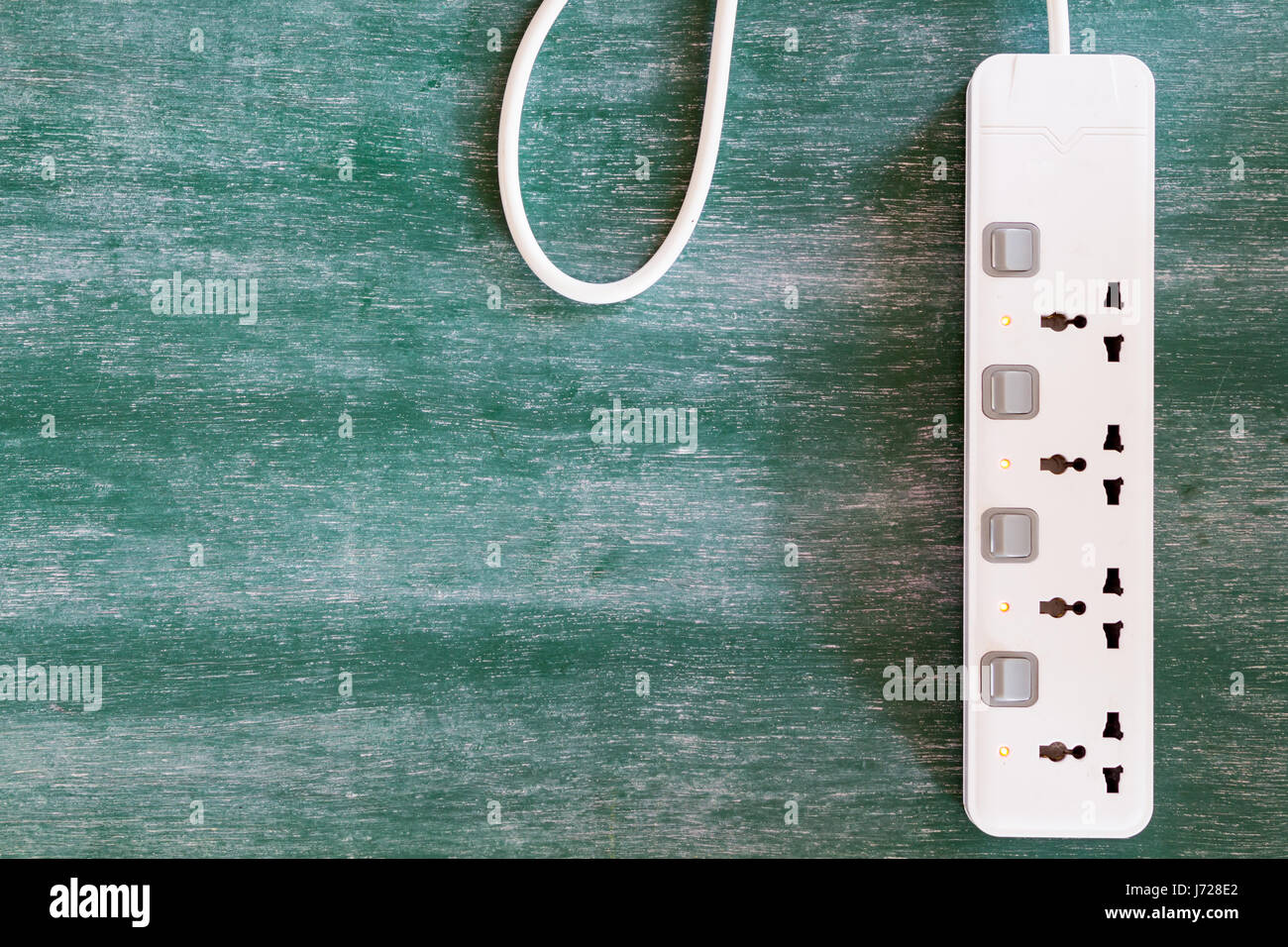 Adapter power plug with chalkboard background Stock Photo - Alamy