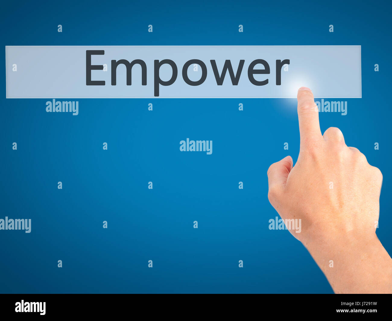 Empower - Hand pressing a button on blurred background concept ...