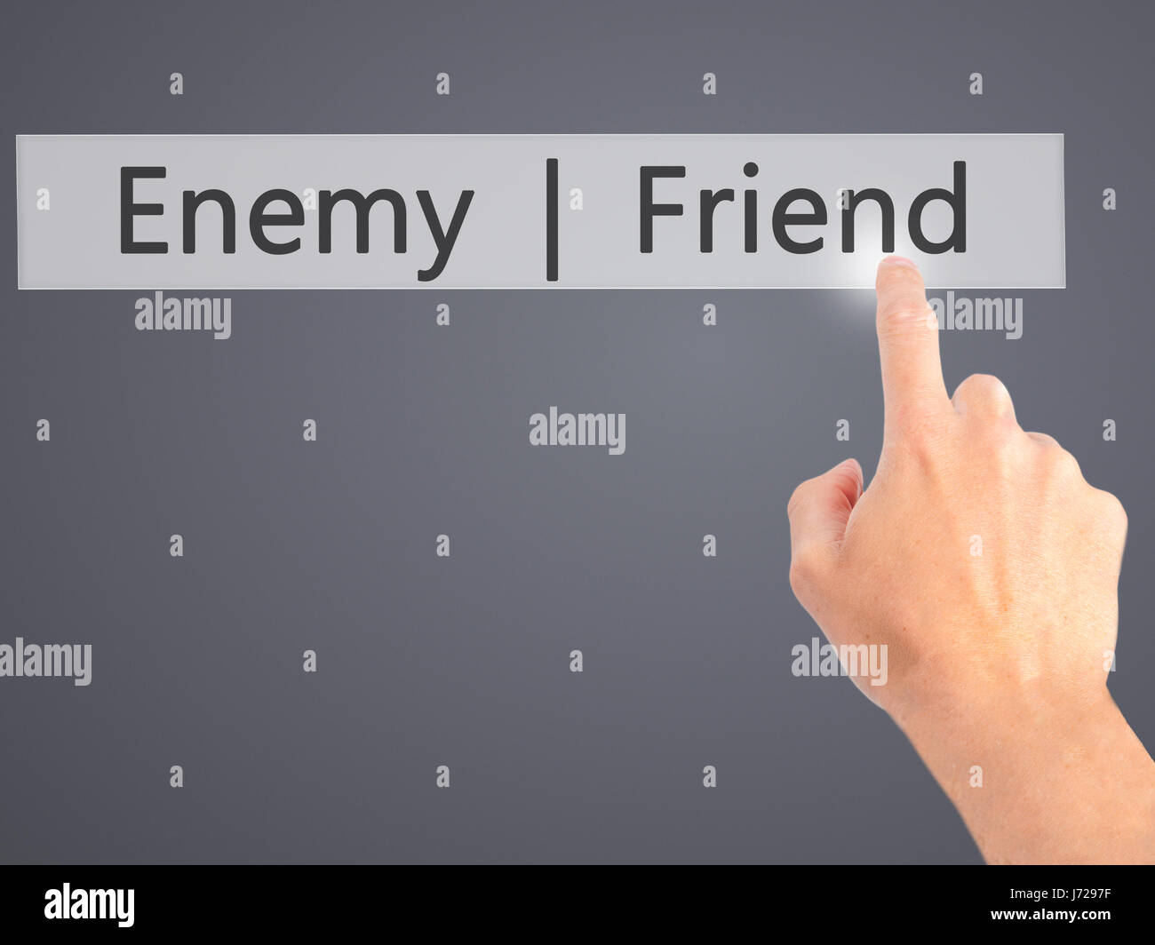 Enemy Friend - Hand pressing a button on blurred background concept ...