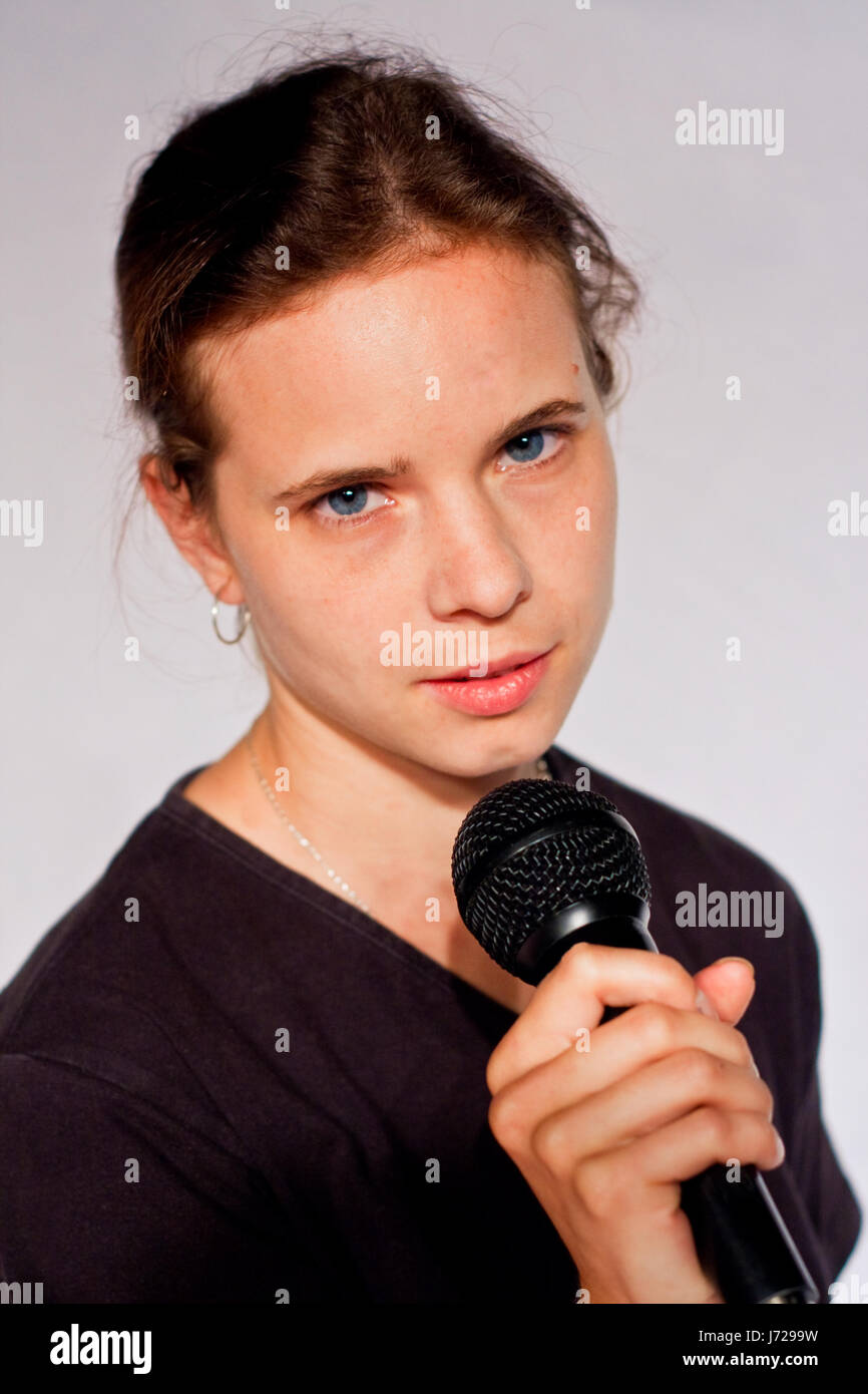 woman with microphone Stock Photo - Alamy