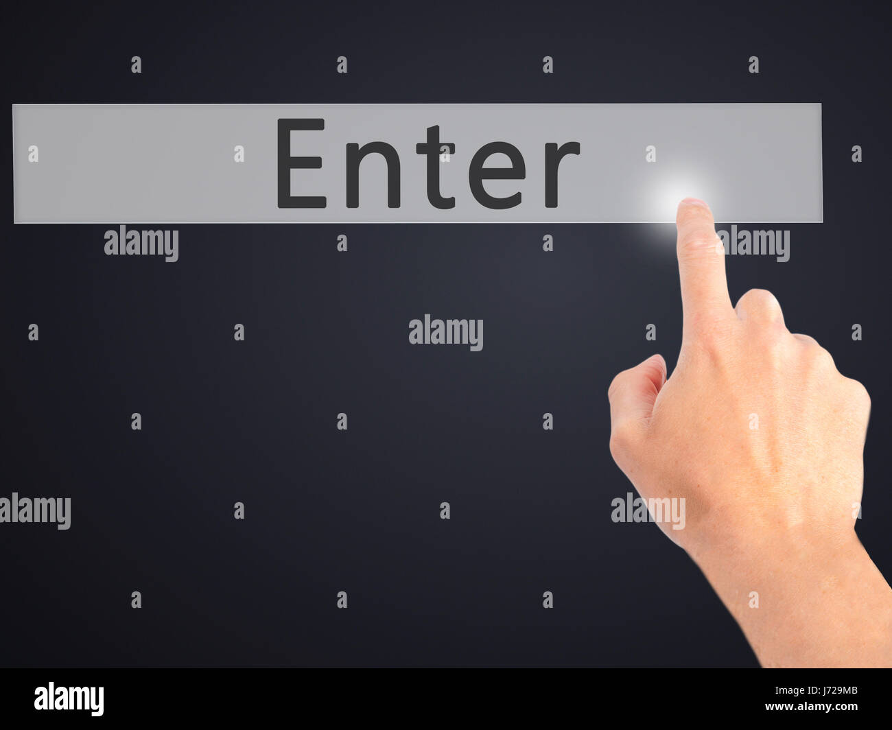 Enter - Hand pressing a button on blurred background concept . Business ...