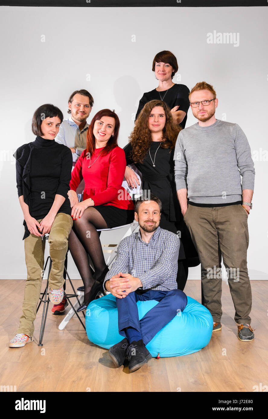 Group of seven people standing hi-res stock photography and images - Alamy