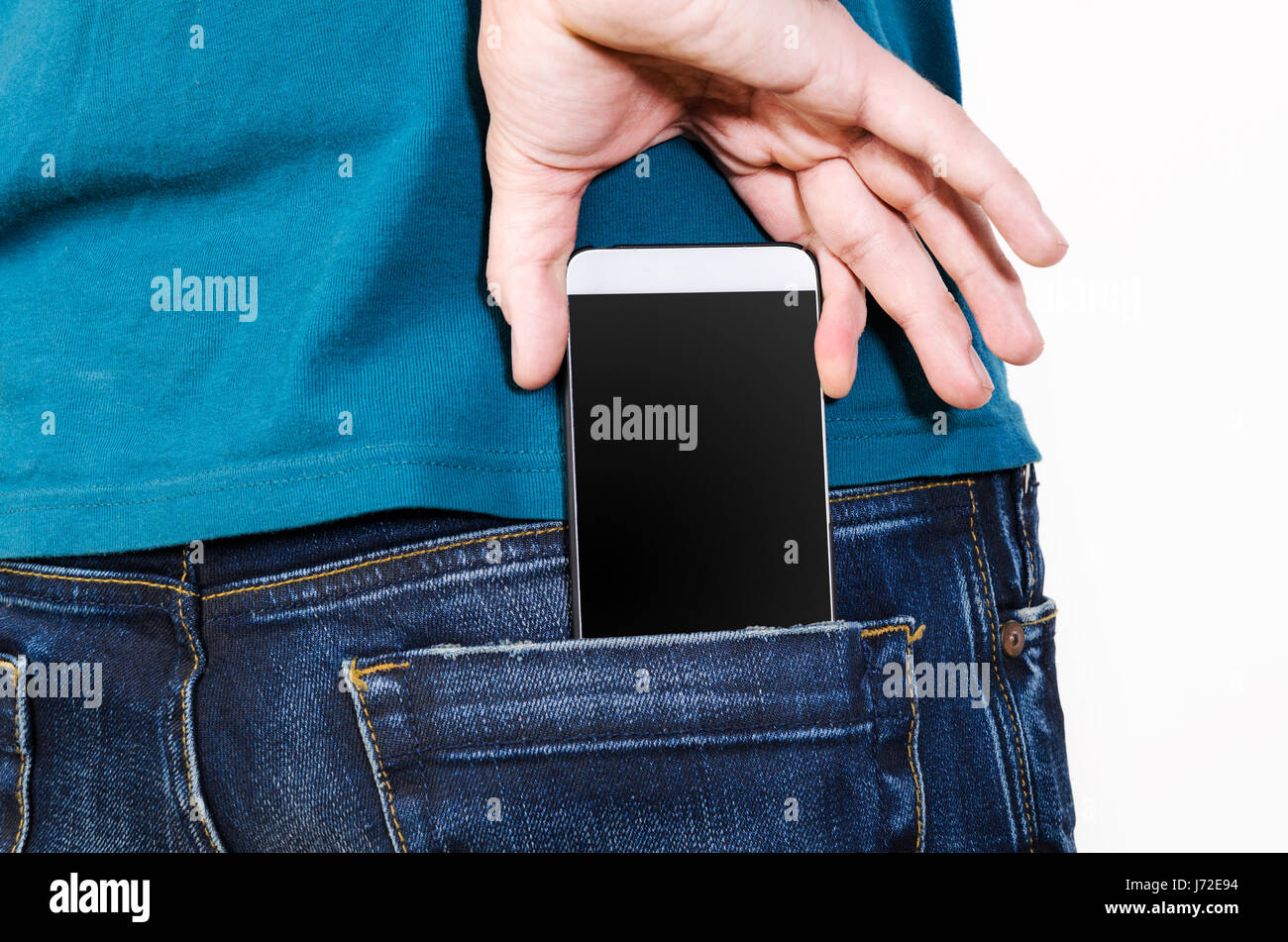 Mobile phone in a pocket Stock Photo - Alamy