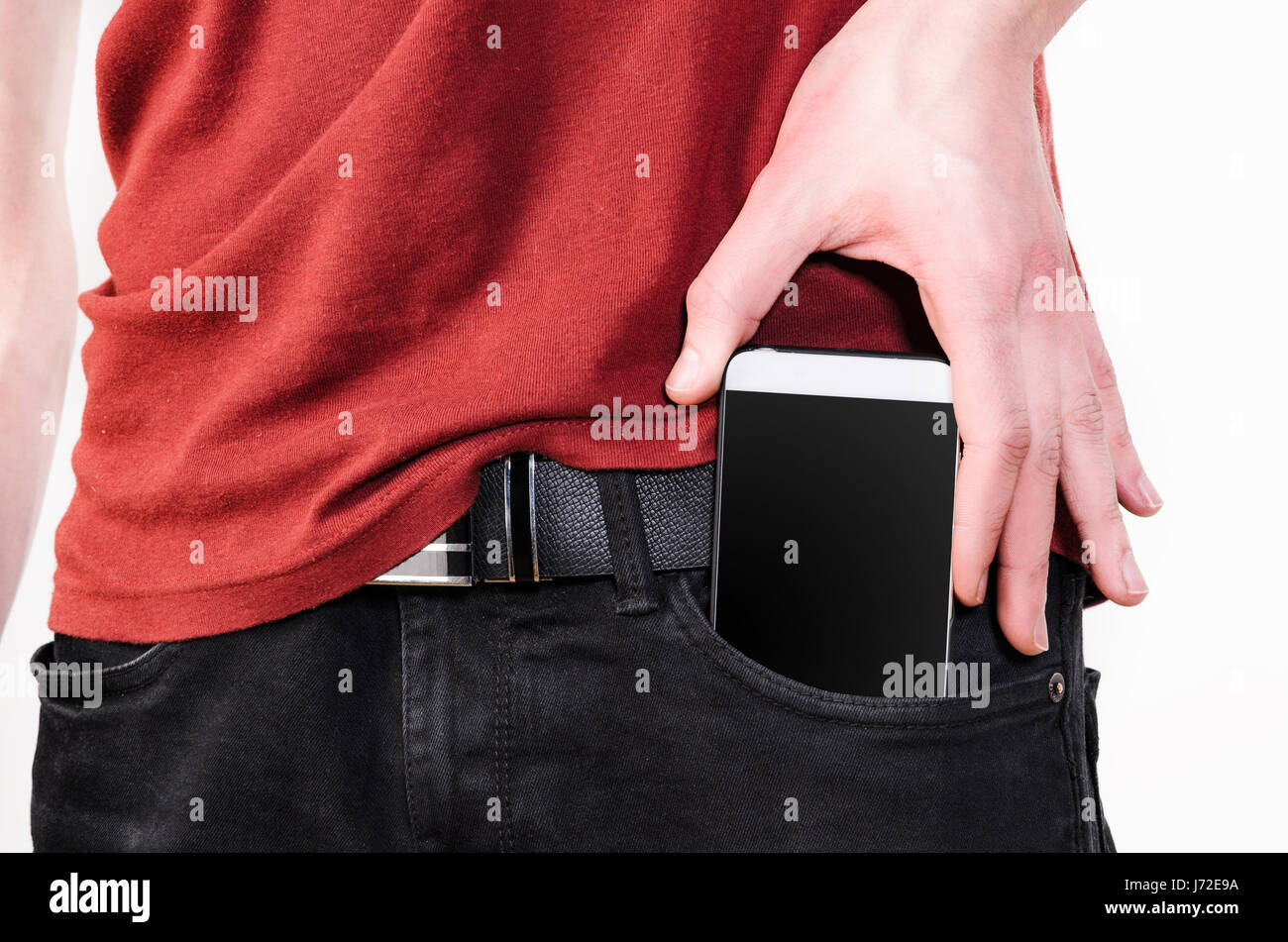 Mobile phone in a pocket Stock Photo - Alamy