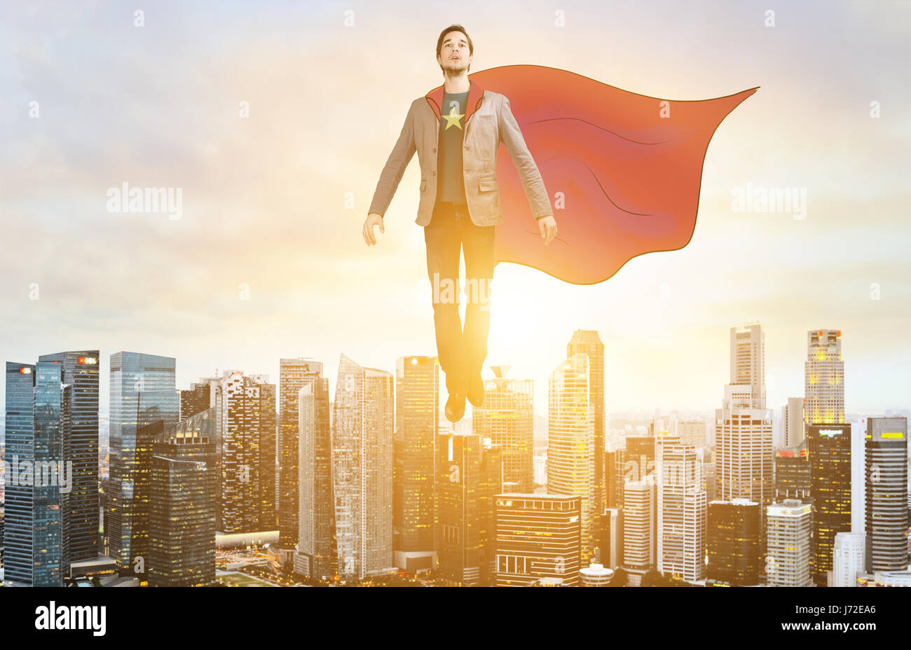 Super hero flying over city hi-res stock photography and images - Alamy