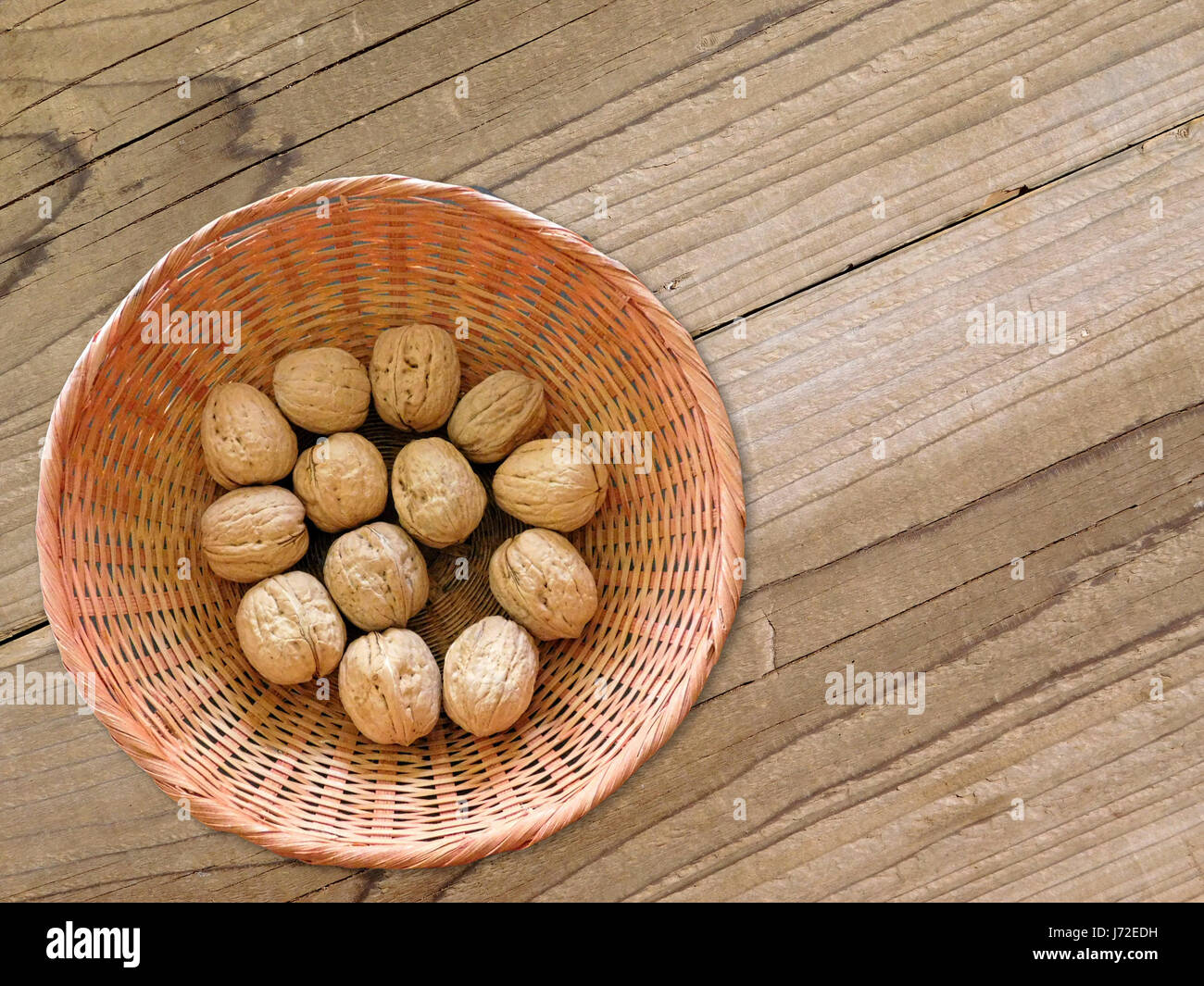 Nuts with shell on wooden background Stock Photo - Alamy