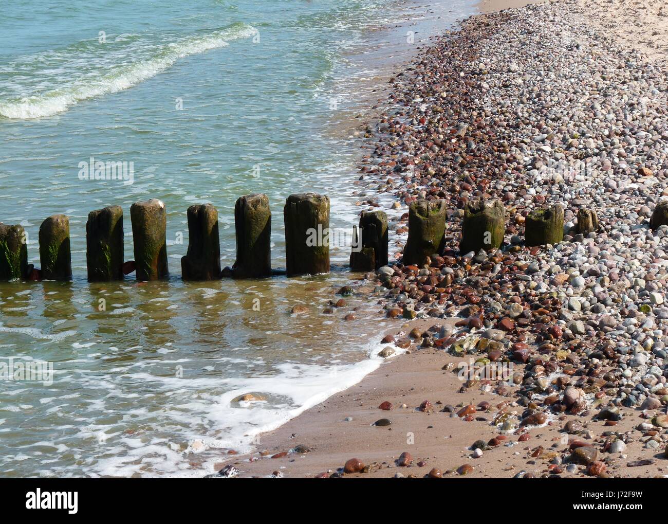 breakwater and stones Stock Photo - Alamy