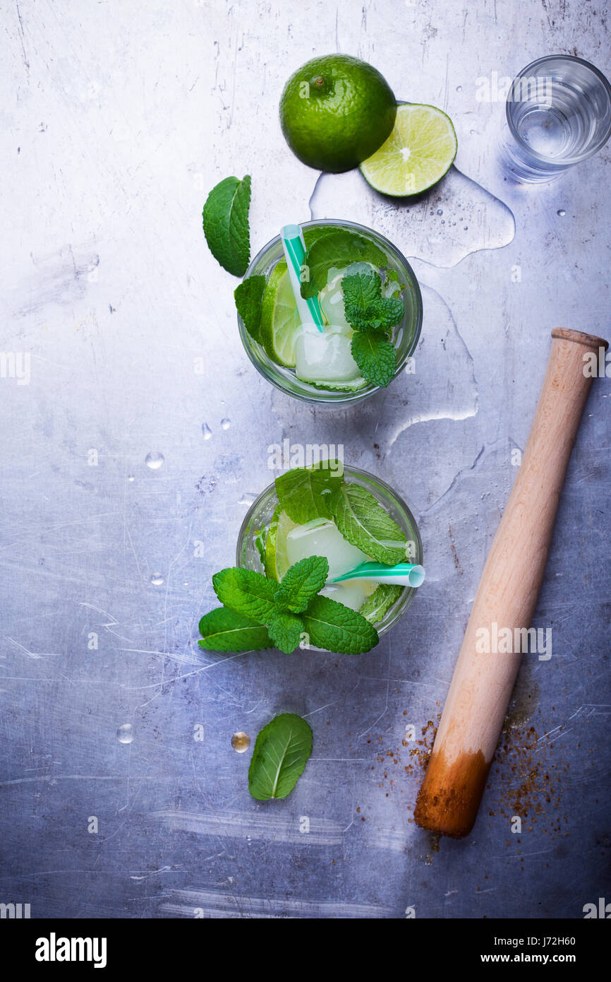 Mojito cocktail on light gray background with copy space for recipe or ...