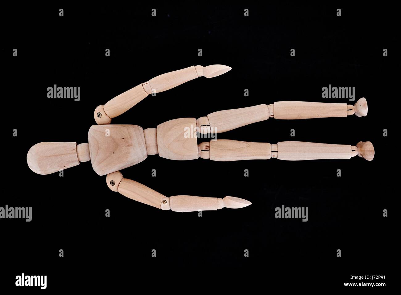 A studio photo of a wooden toy mannequin Stock Photo - Alamy