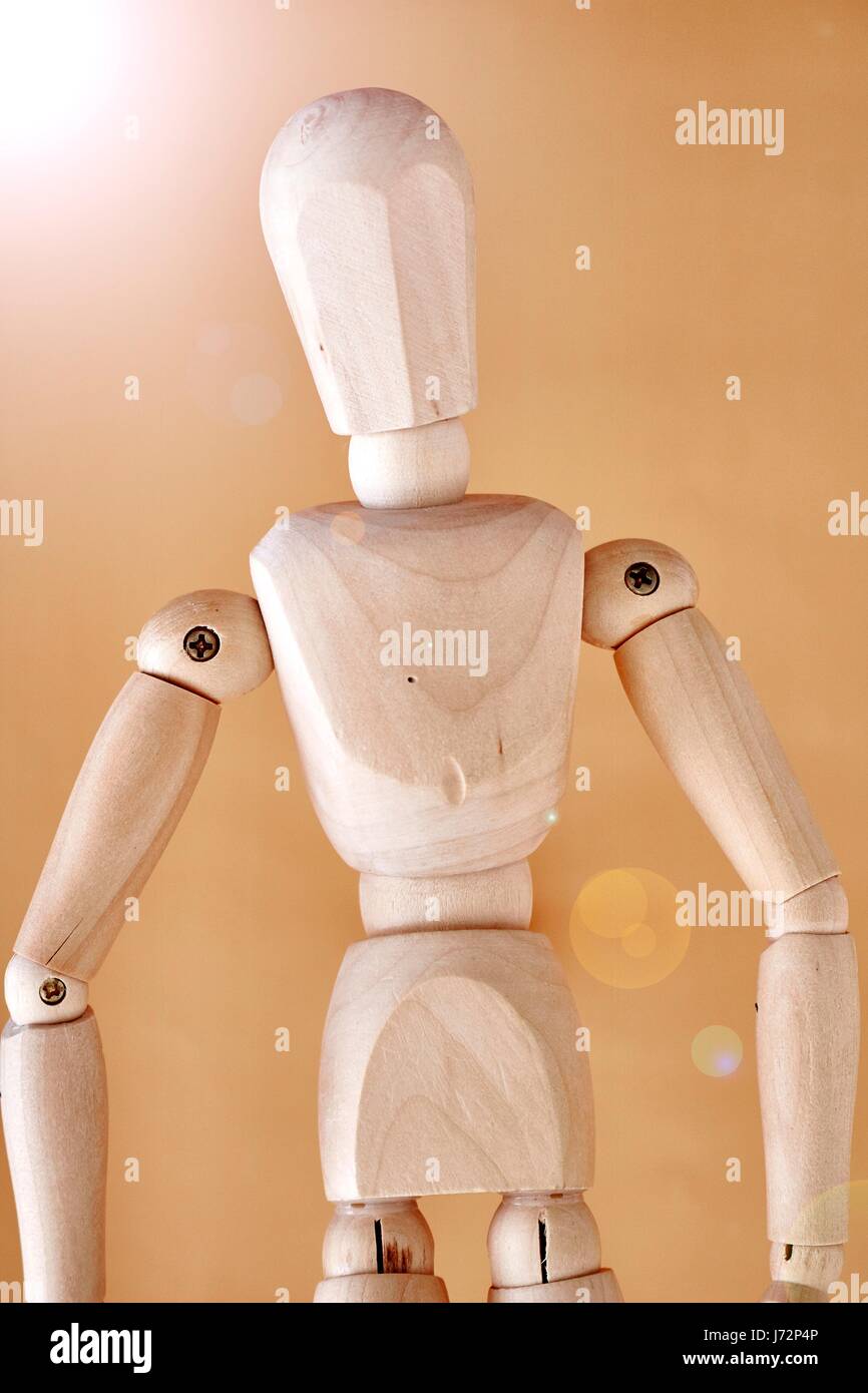 A studio photo of a wooden toy mannequin Stock Photo - Alamy