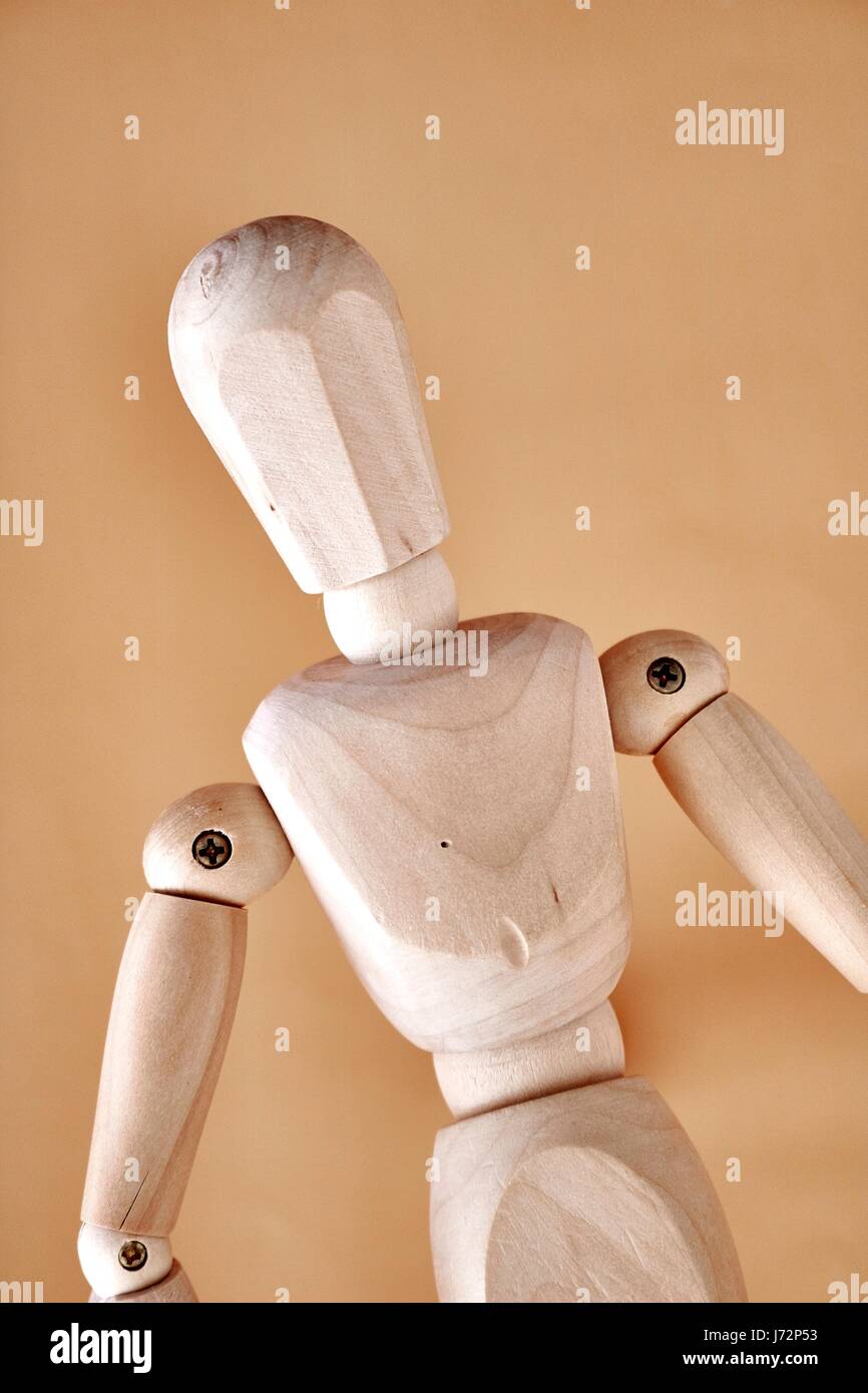 A studio photo of a wooden toy mannequin Stock Photo - Alamy