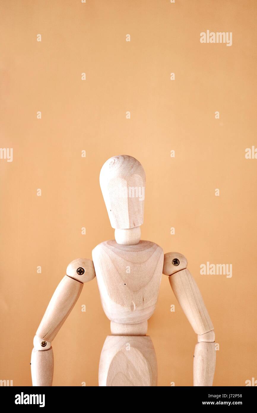 A studio photo of a wooden toy mannequin Stock Photo - Alamy