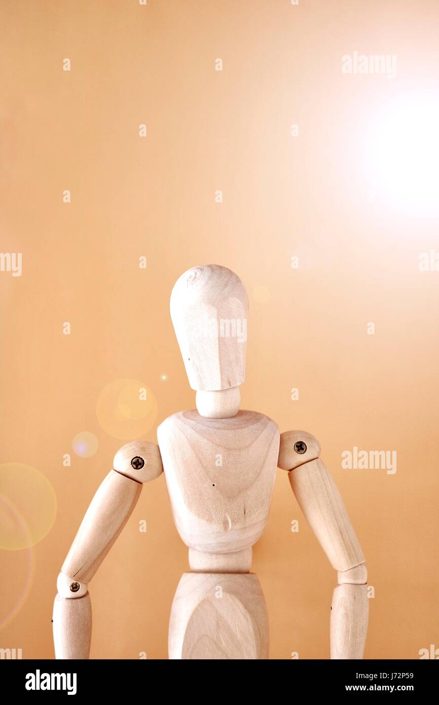 A studio photo of a wooden toy mannequin Stock Photo - Alamy