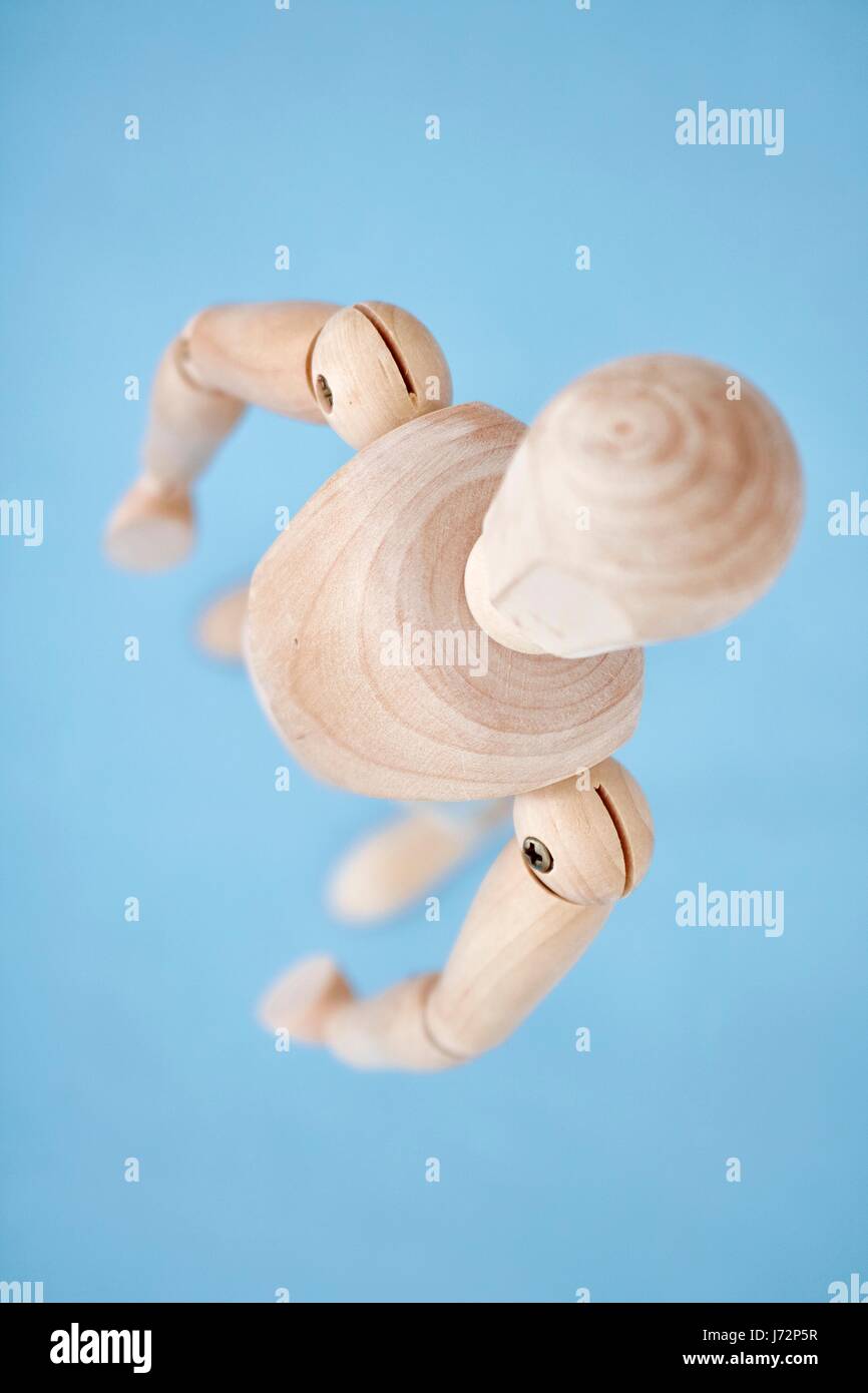 A studio photo of a wooden toy mannequin Stock Photo - Alamy
