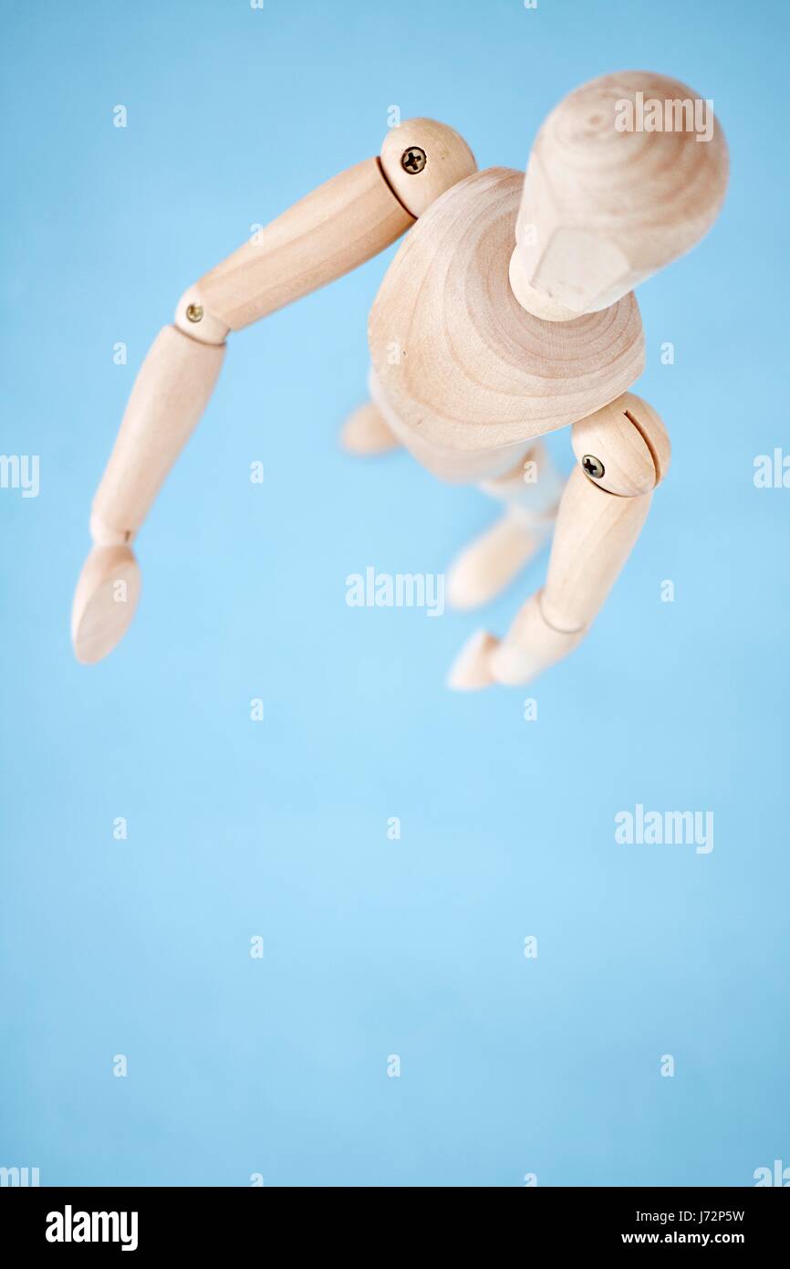 A studio photo of a wooden toy mannequin Stock Photo - Alamy