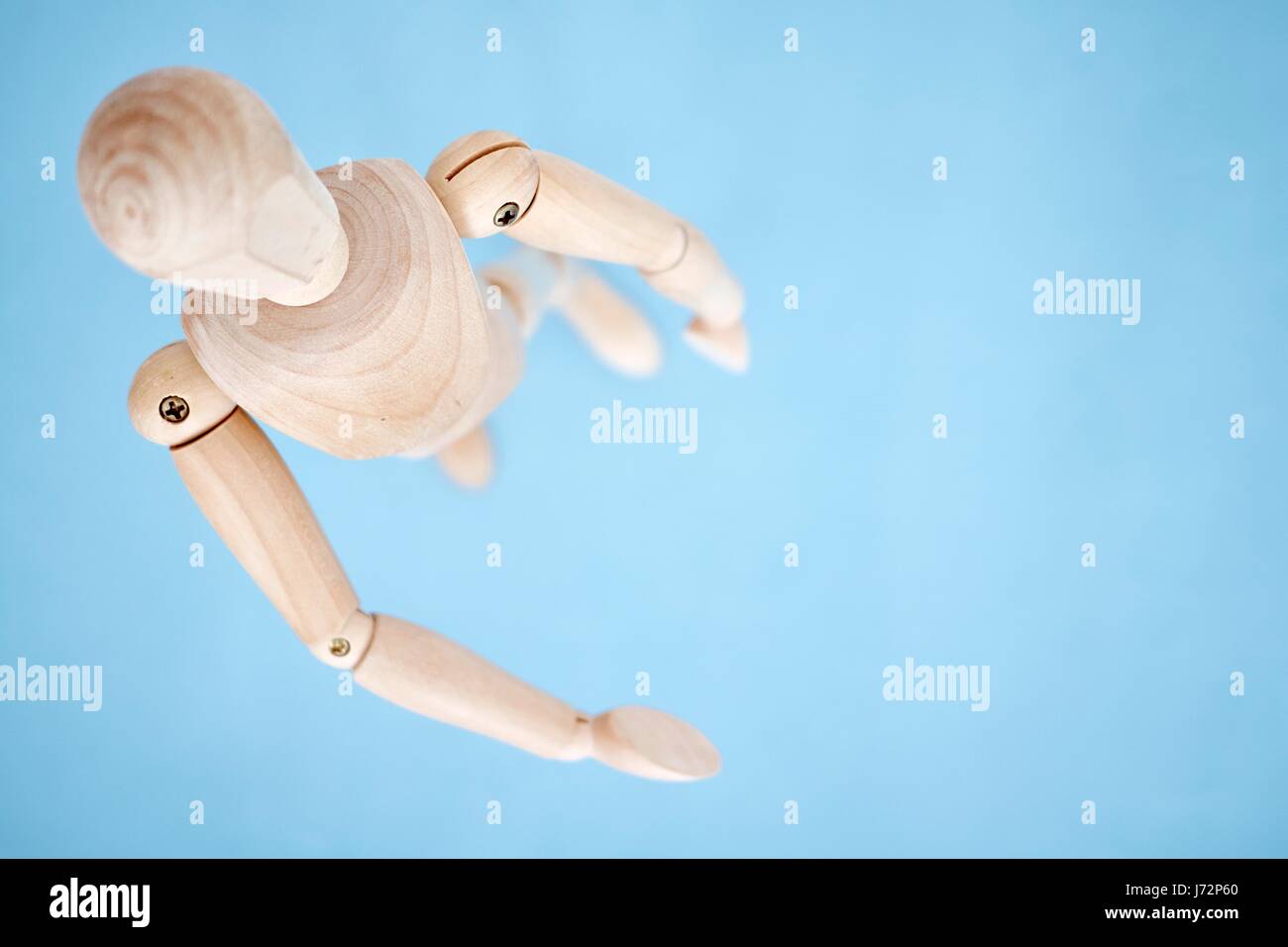A studio photo of a wooden toy mannequin Stock Photo - Alamy