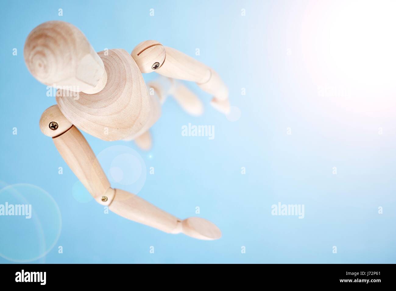 A studio photo of a wooden toy mannequin Stock Photo - Alamy