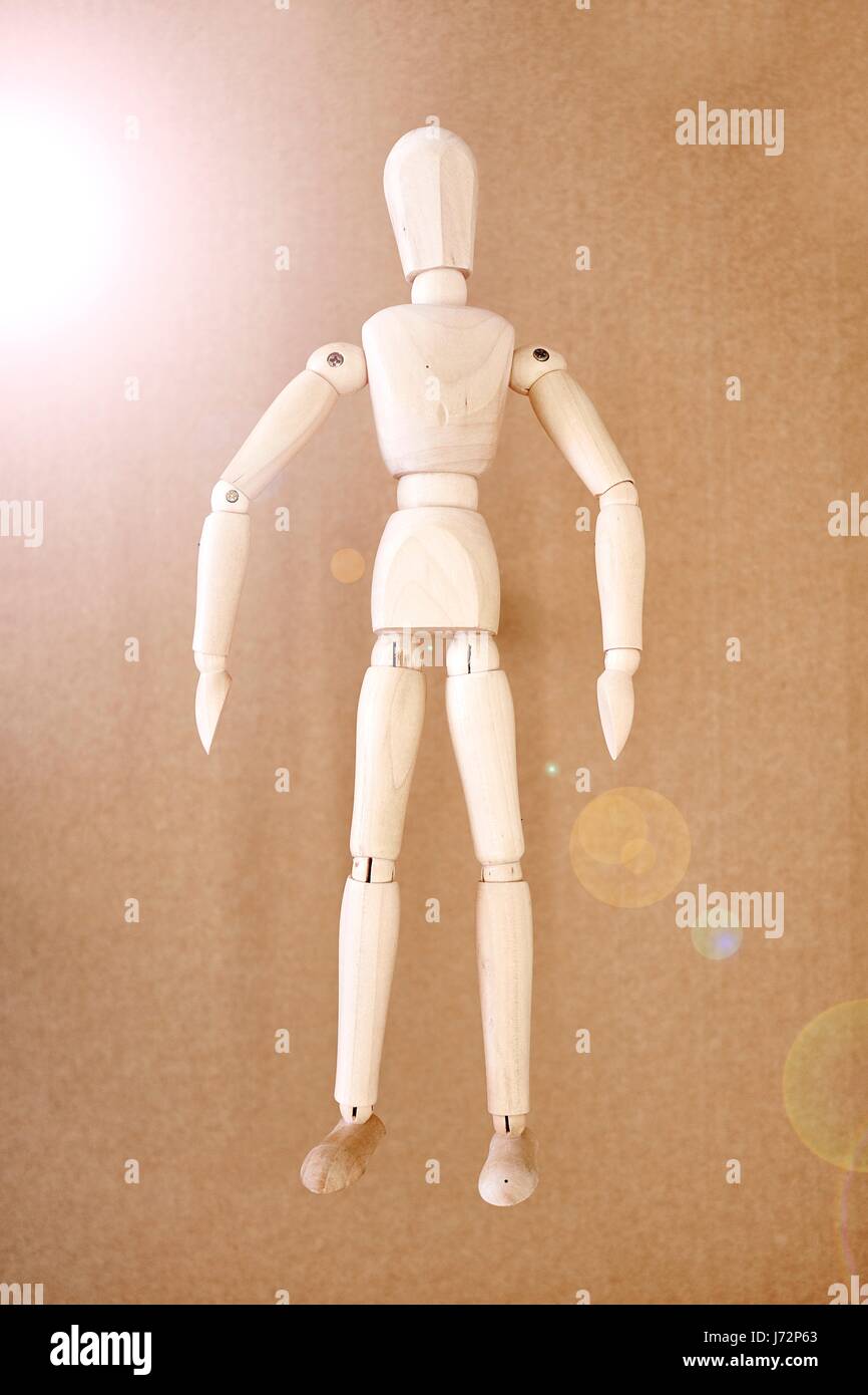 A studio photo of a wooden toy mannequin Stock Photo - Alamy