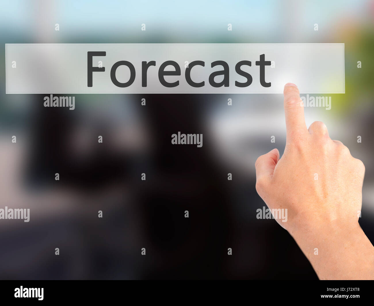 Forecast - Hand pressing a button on blurred background concept ...