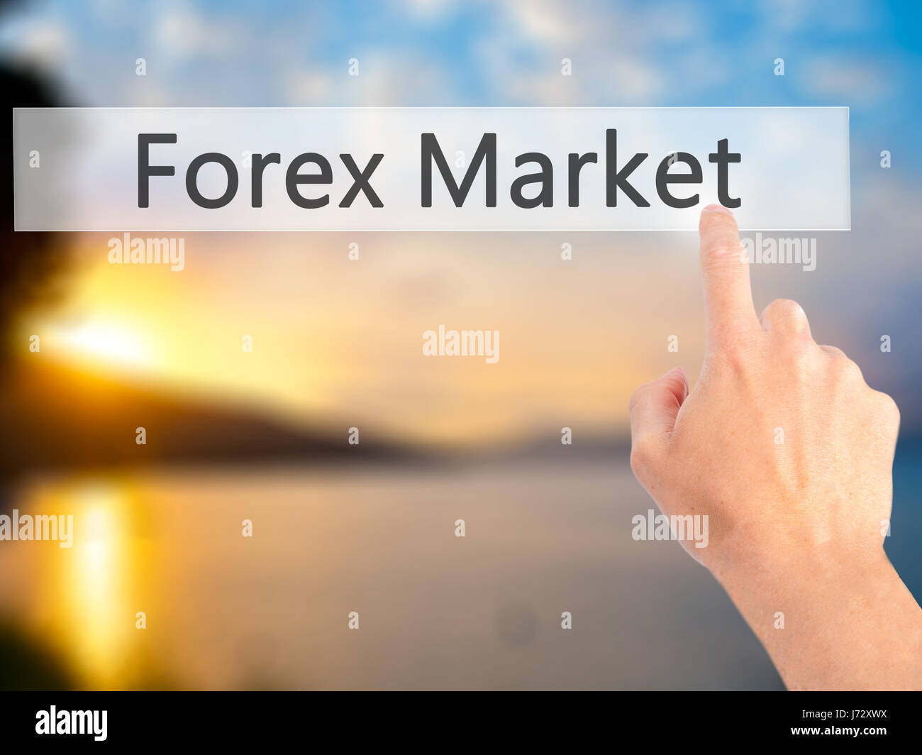 Forex Market - Hand pressing a button on blurred background concept ...