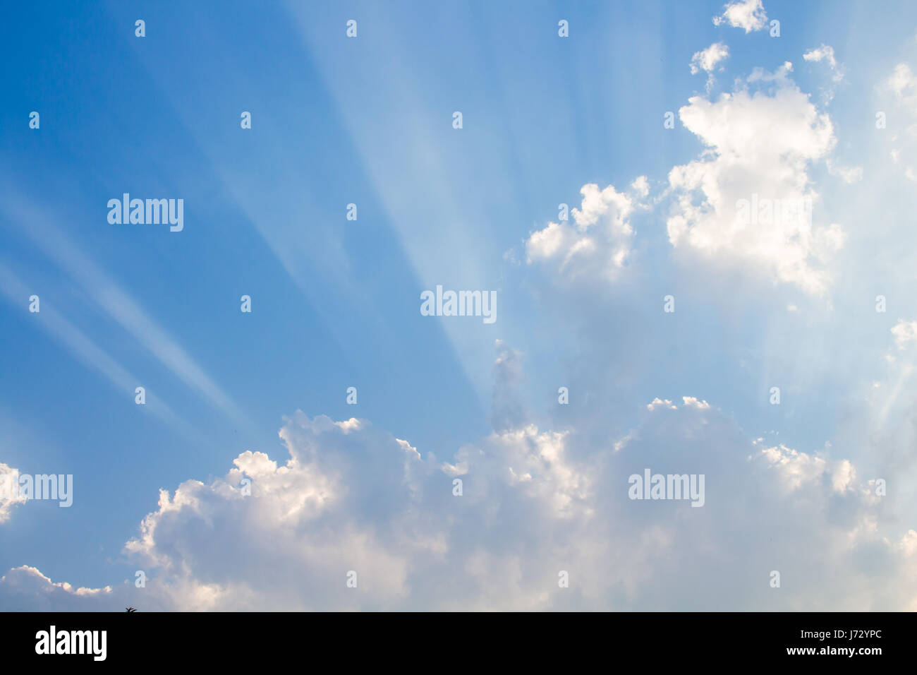 sun beam on blue sky Stock Photo - Alamy