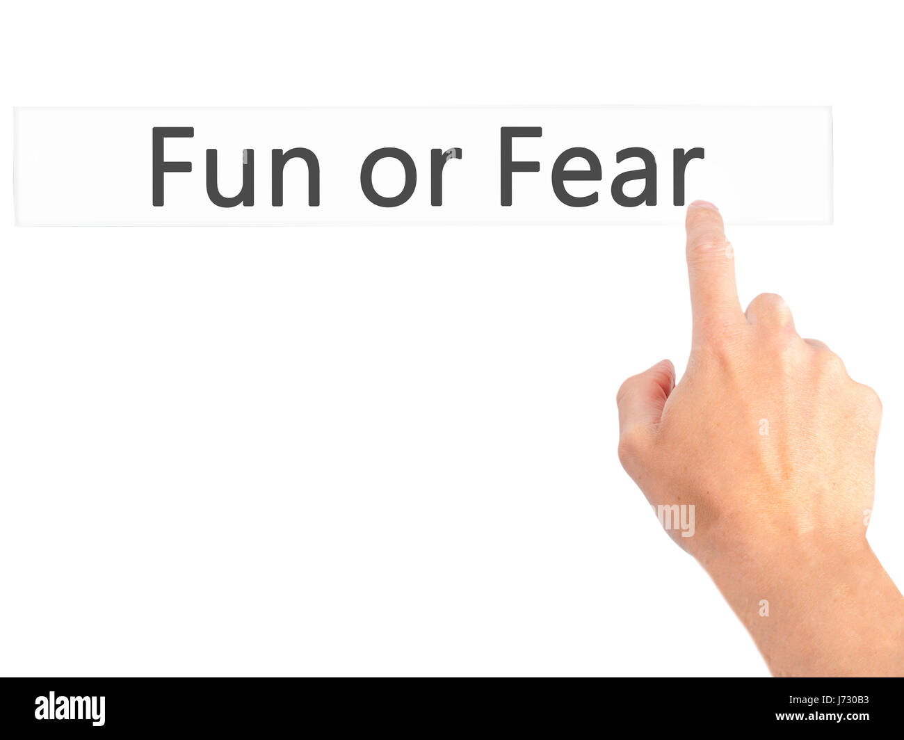 Fun or Fear - Hand pressing a button on blurred background concept ...