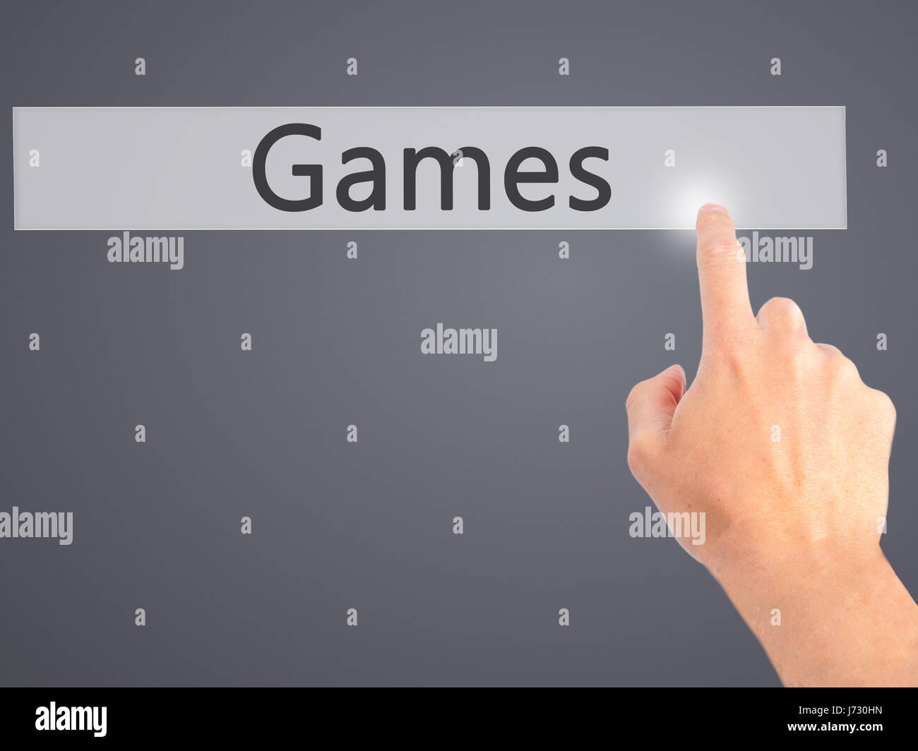 Games - Hand pressing a button on blurred background concept . Business ...