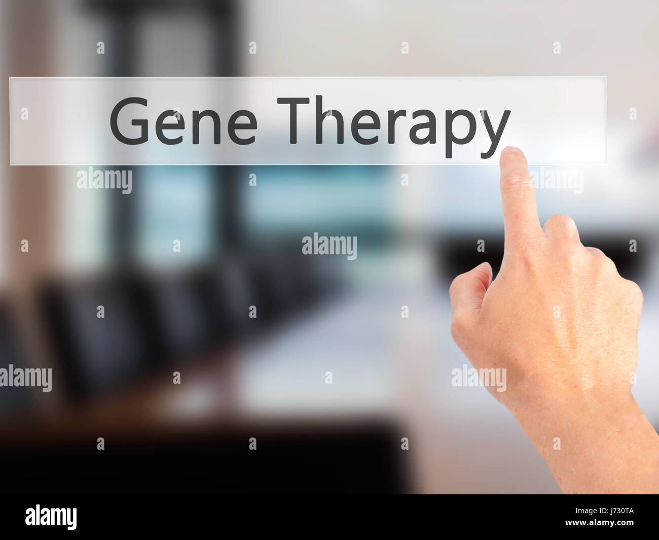 Gene Therapy - Hand pressing a button on blurred background concept ...