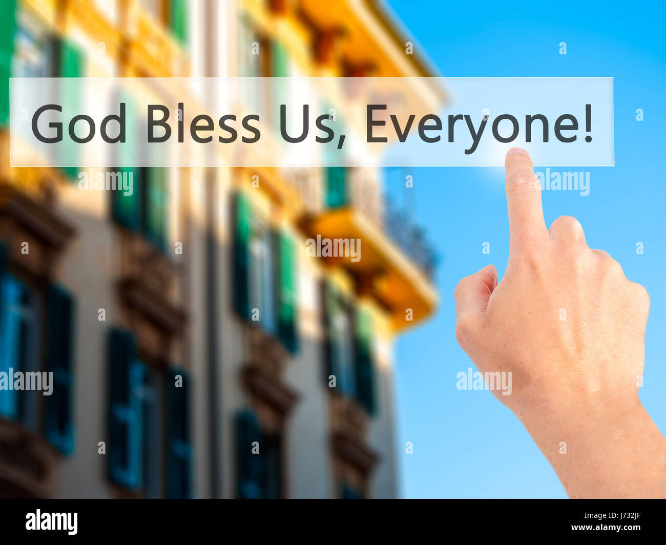 God Bless Us, Everyone - Hand pressing a button on blurred background ...