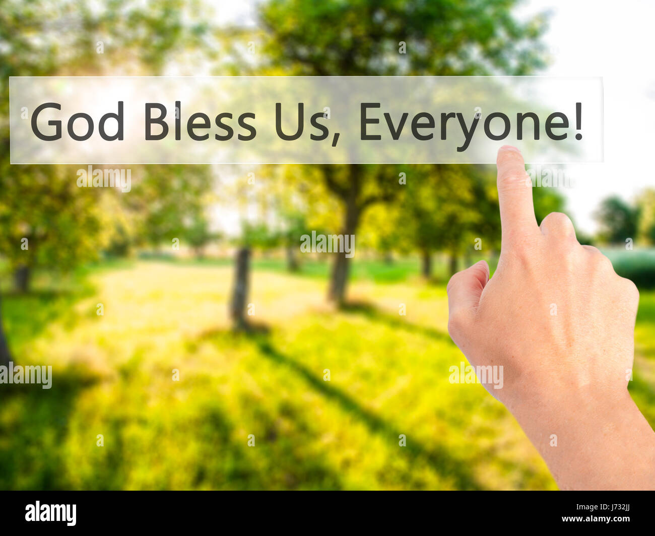 God Bless Us, Everyone - Hand pressing a button on blurred background ...