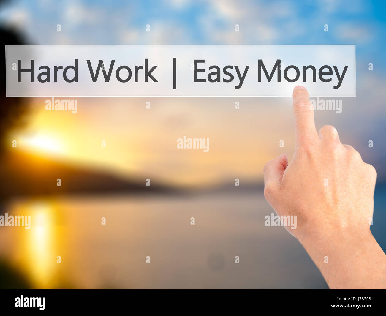 Hard Work Easy Money - Hand pressing a button on blurred background ...