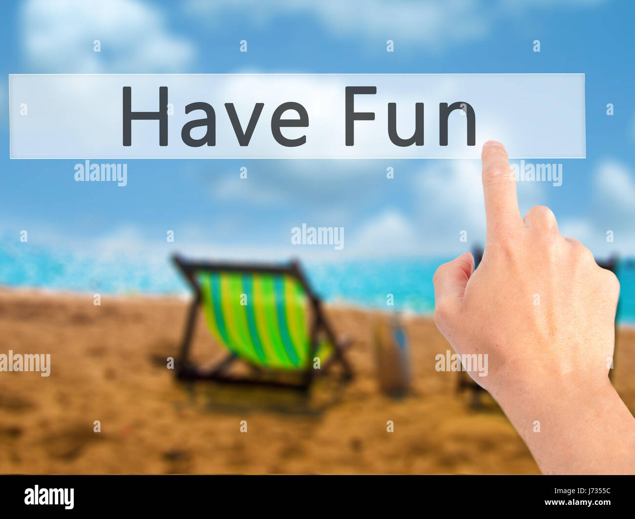 Have Fun - Hand pressing a button on blurred background concept ...
