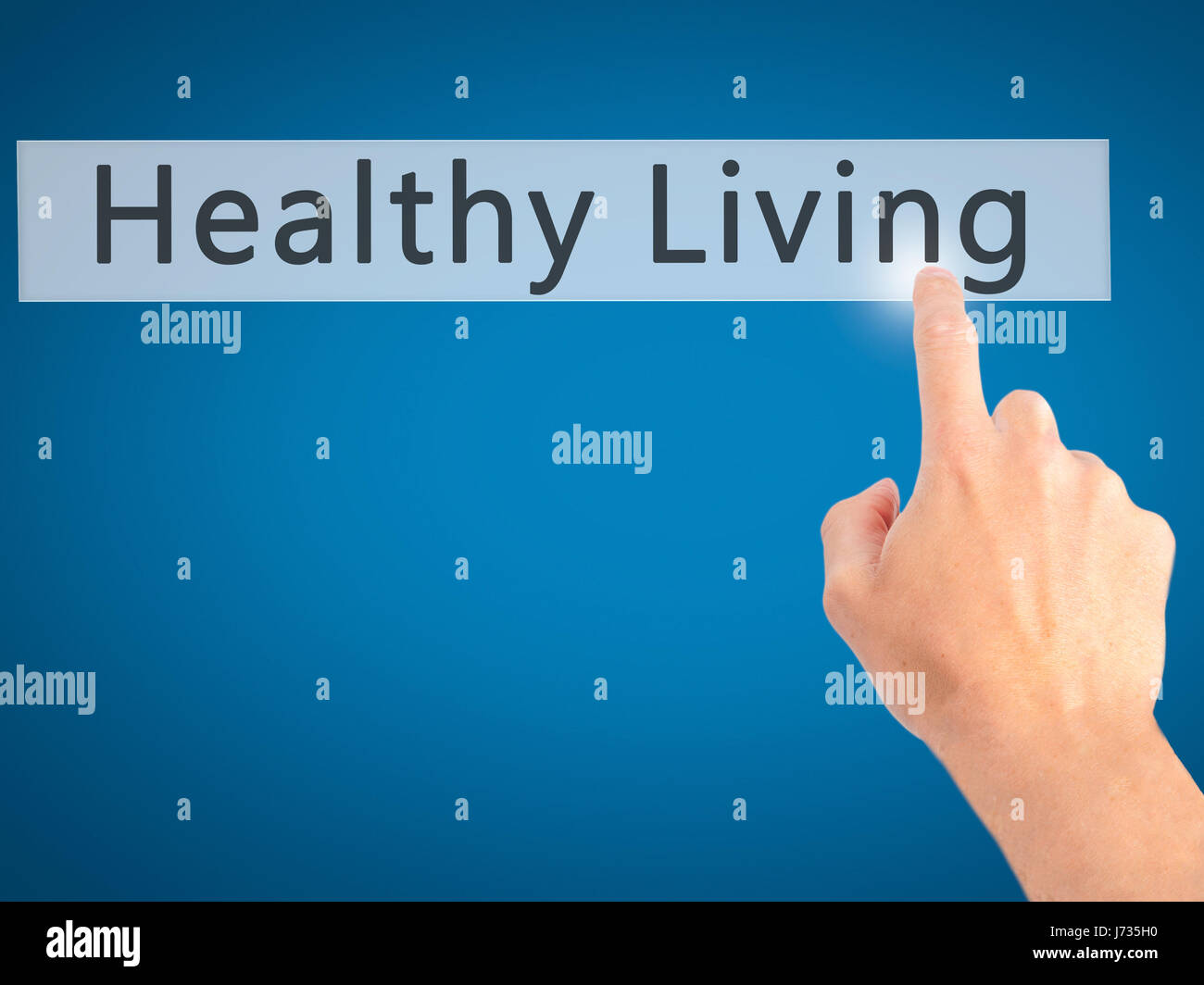 Healthy Living - Hand pressing a button on blurred background concept ...
