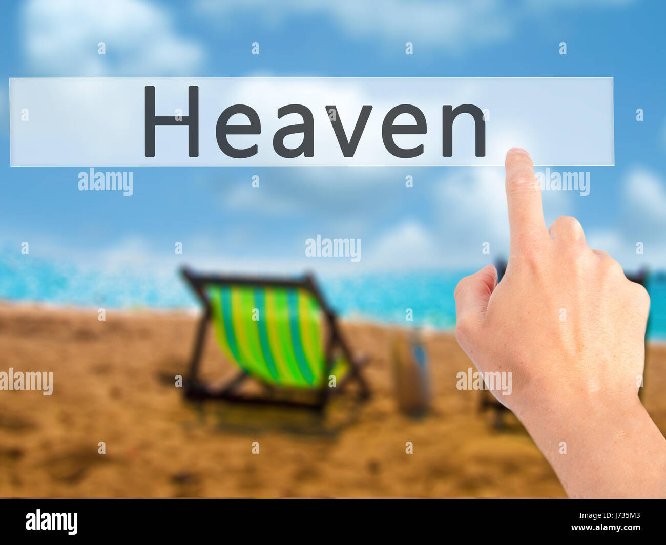 Heaven - Hand pressing a button on blurred background concept ...