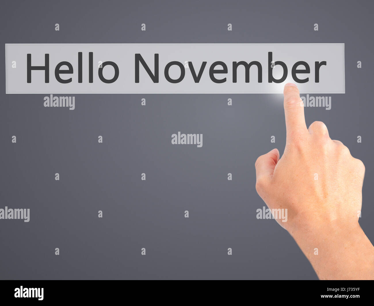 Hello November - Hand pressing a button on blurred background concept ...