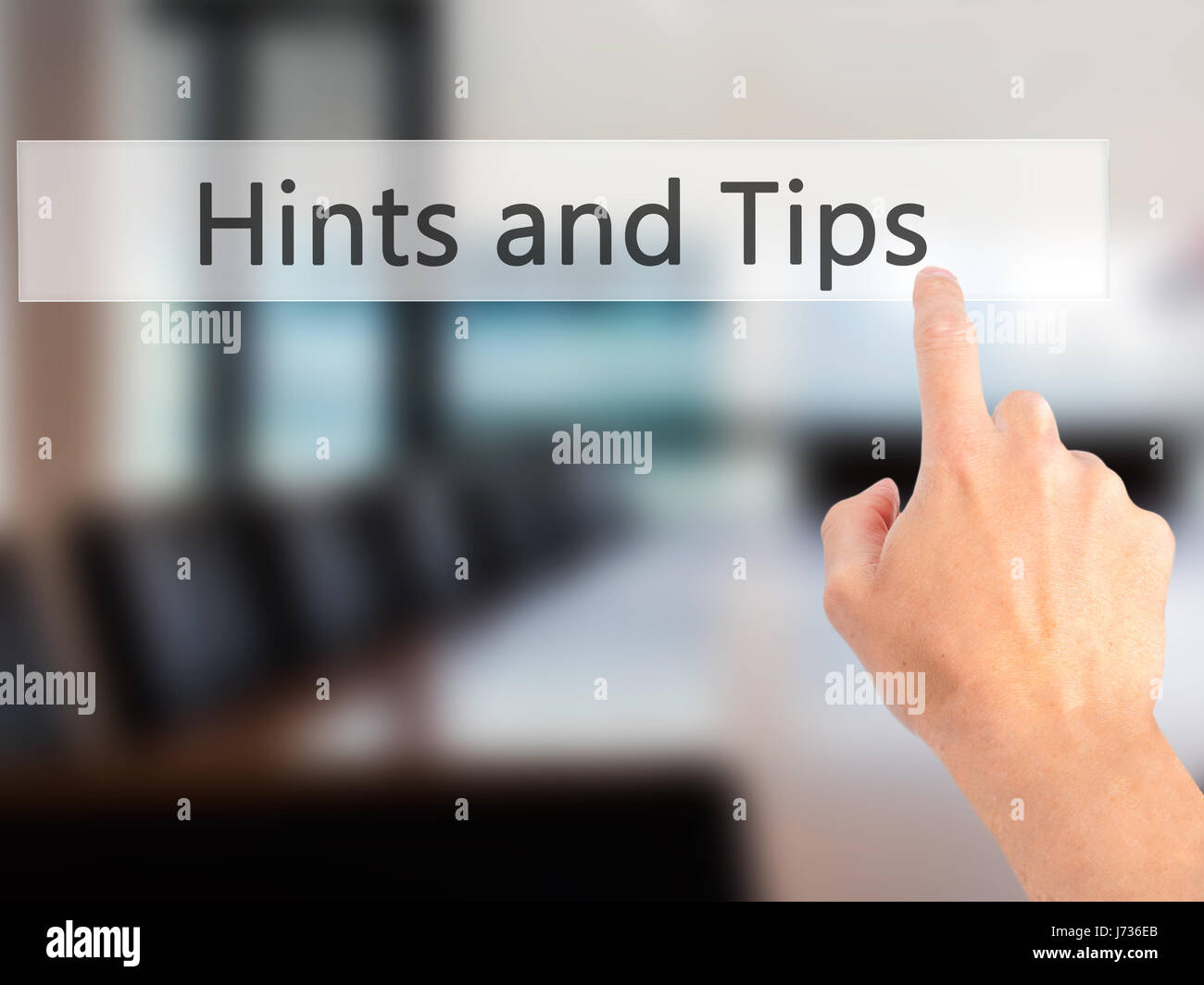 Hints and Tips - Hand pressing a button on blurred background concept ...
