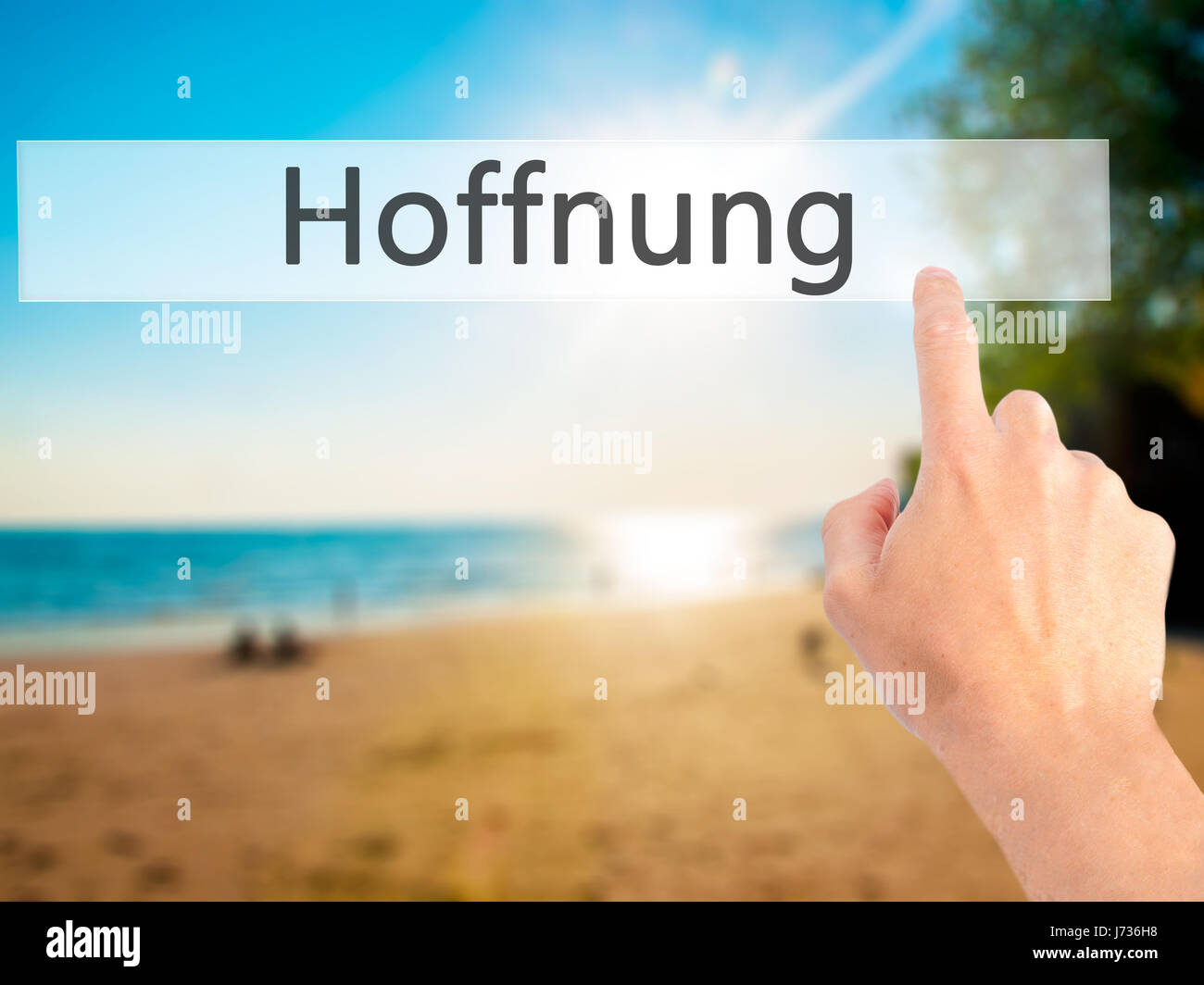 Hoffnung (Hope in German) - Hand pressing a button on blurred ...