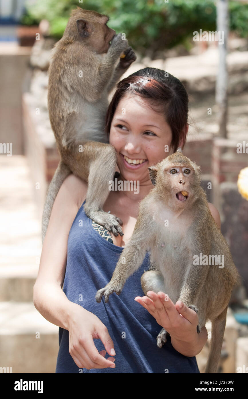 teenager with monkey Stock Photo - Alamy