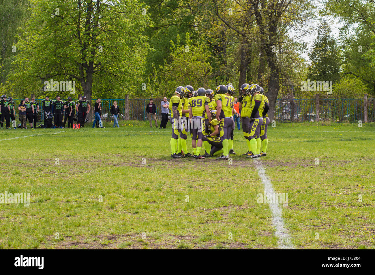 Players in a Huddle During American Football Match Stock Photo - Alamy