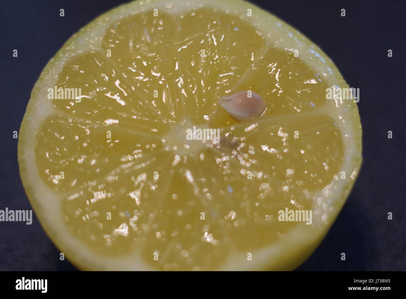 Cut a piece of lemon Stock Photo - Alamy