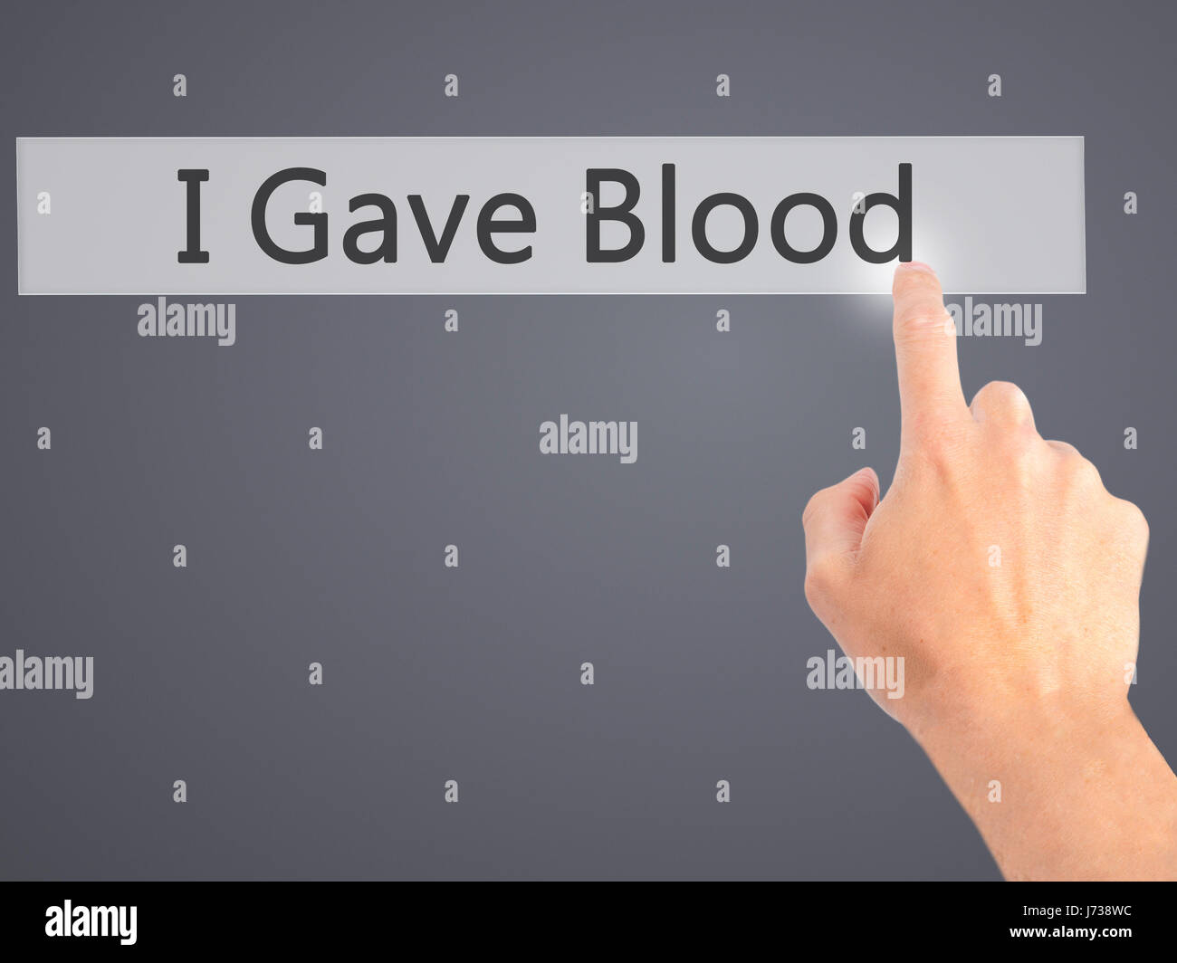 I Gave Blood - Hand pressing a button on blurred background concept ...