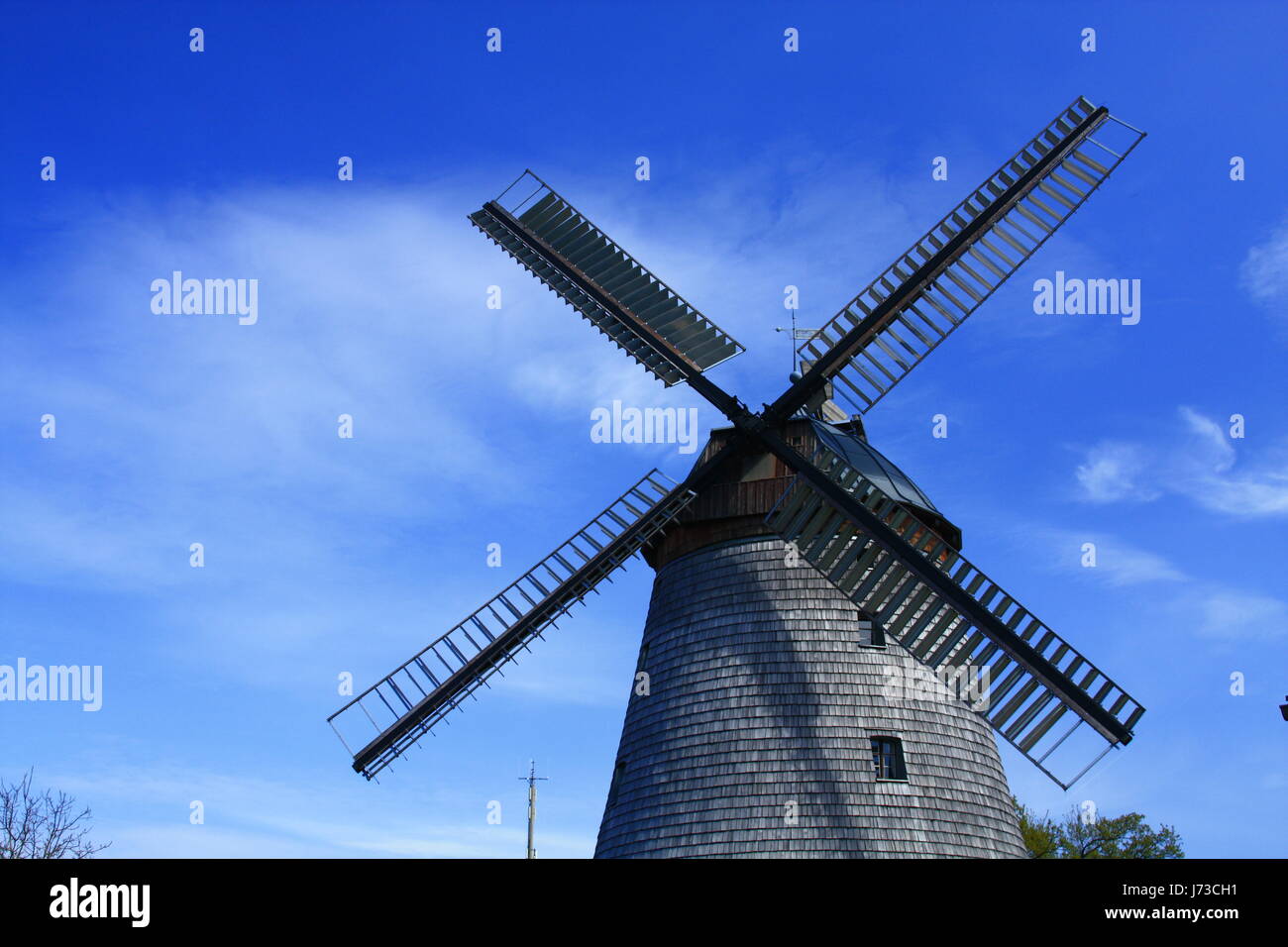 blue wing windmill wind energy firmament sky pinwheel wind blue motion ...