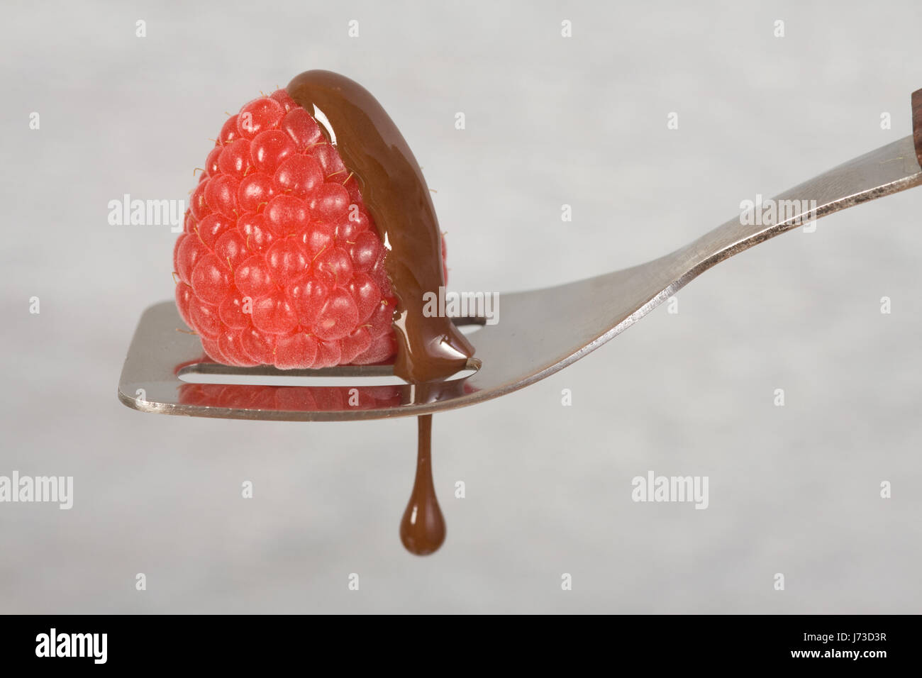 raspberry with chocolate Stock Photo - Alamy