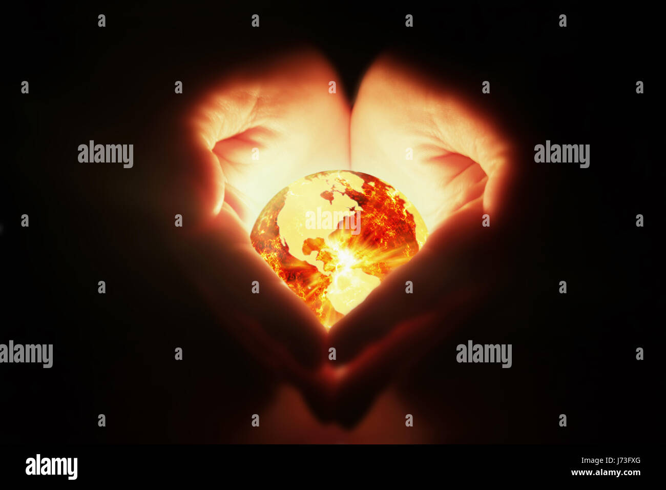 earth in hand Stock Photo - Alamy