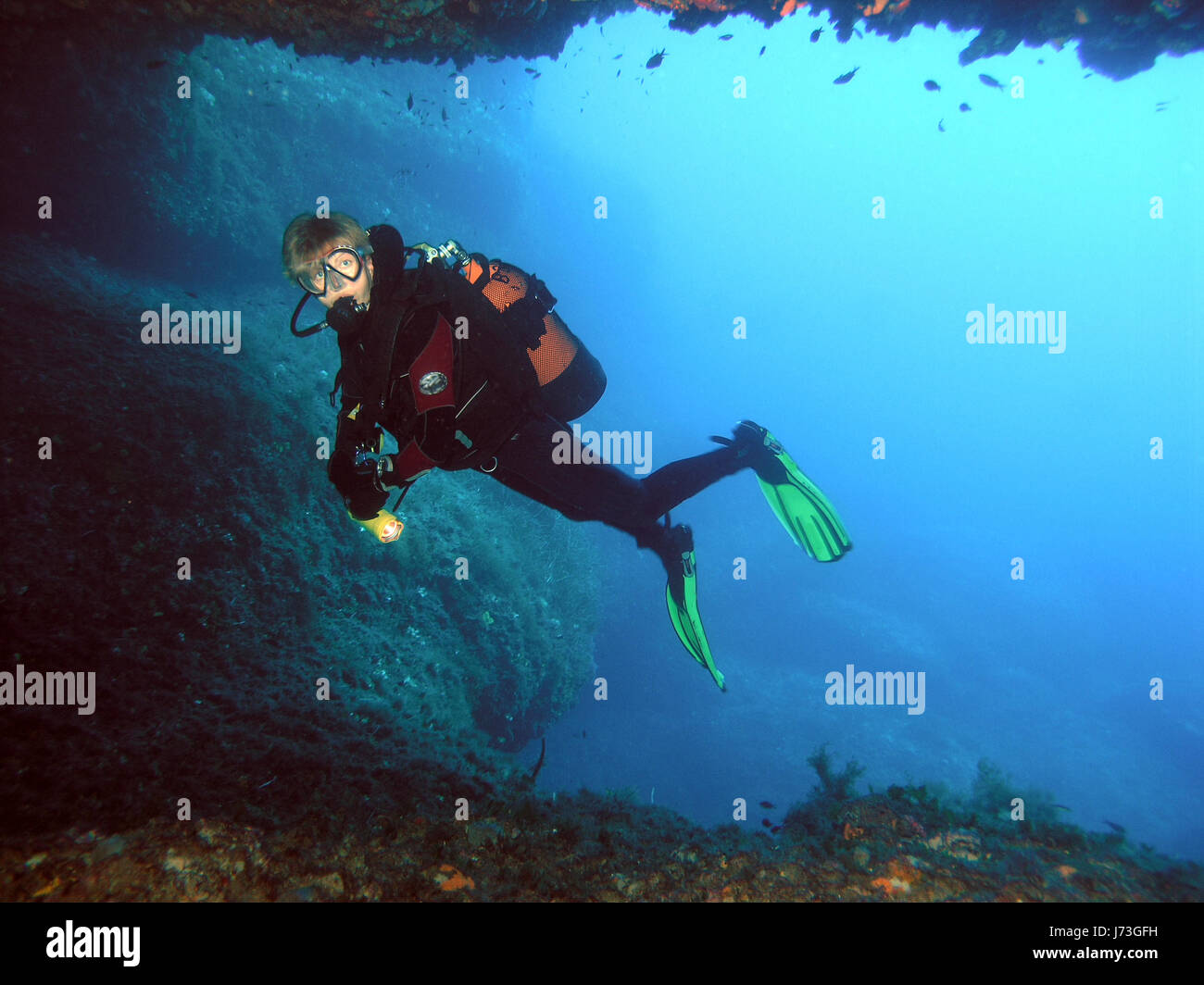 scuba diver at the cave entrance Stock Photo - Alamy