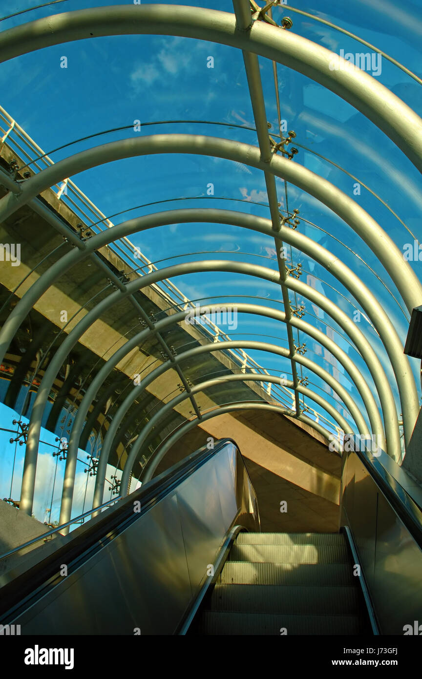 escalator glass chalice tumbler elevator lift industrial tunnel ...