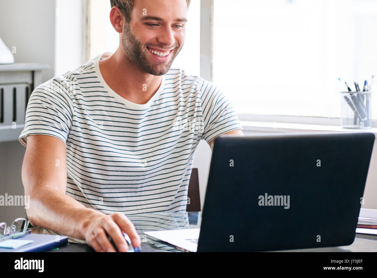 Seated desk working studying hi-res stock photography and images - Alamy