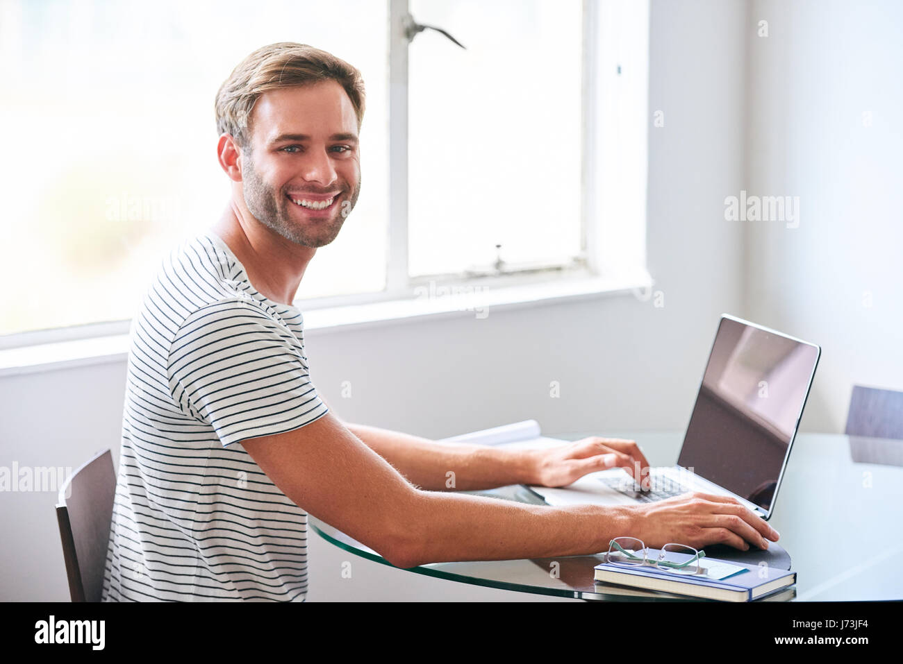 Seated Behind Desk High Resolution Stock Photography and Images - Alamy