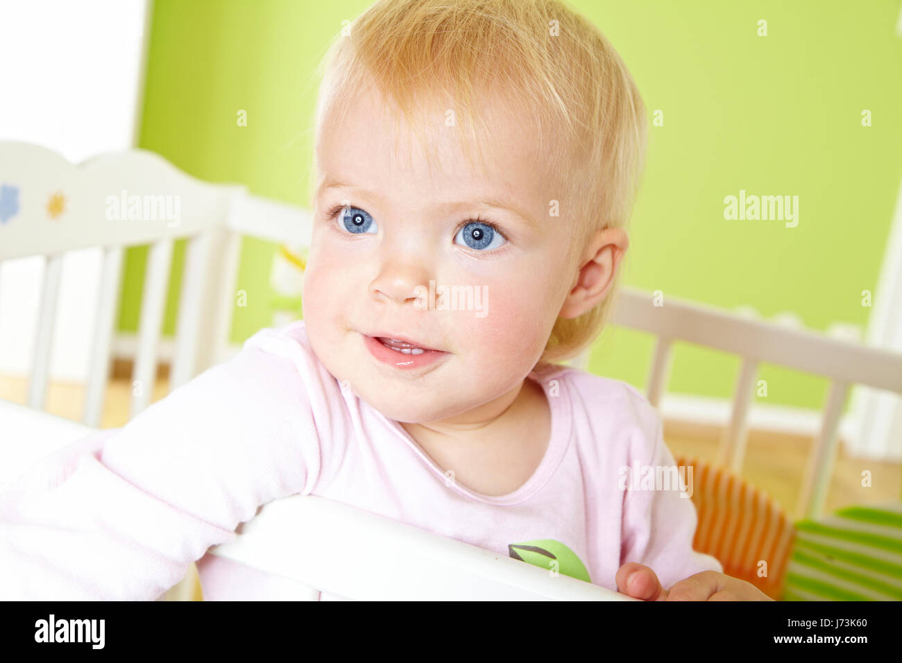 14 month old girl in crib Stock Photo - Alamy