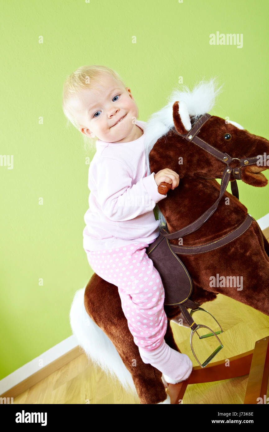 toddler and rocking horse Stock Photo - Alamy